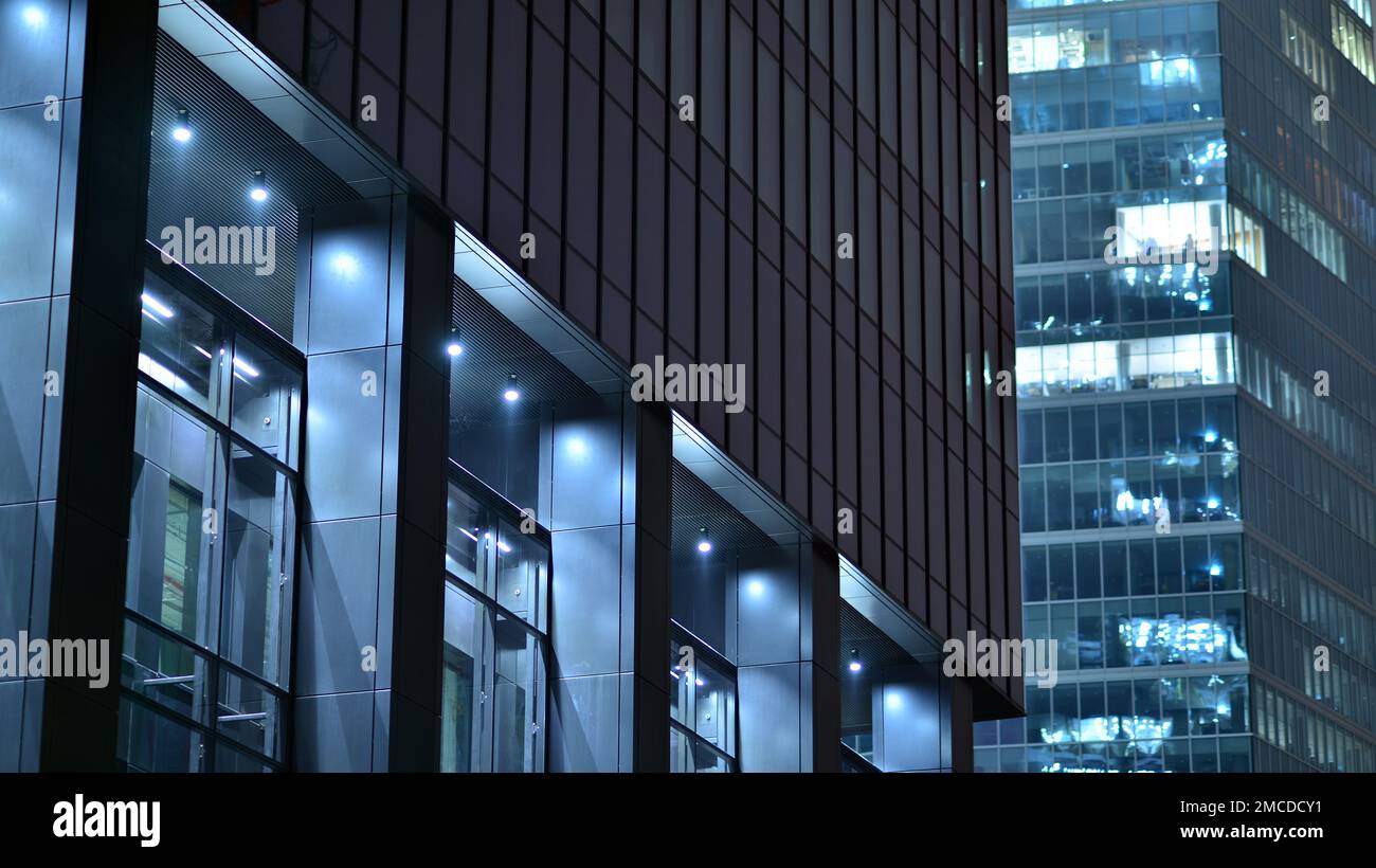 Modern office building in city at the night. View on illuminated ...