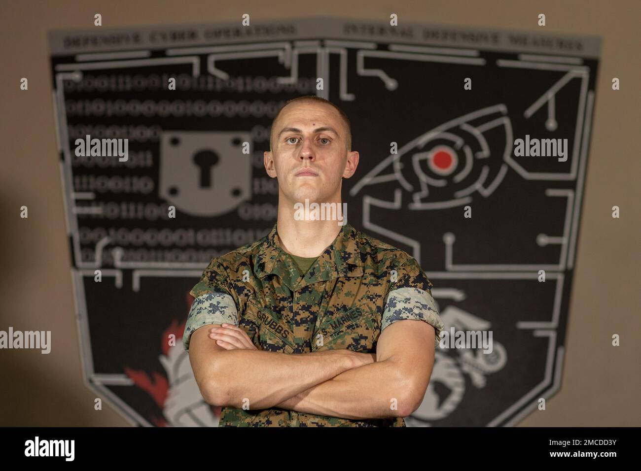 U.S. Marine Corps Cpl. Charles Grubbs, a cyberspace warfare operator ...
