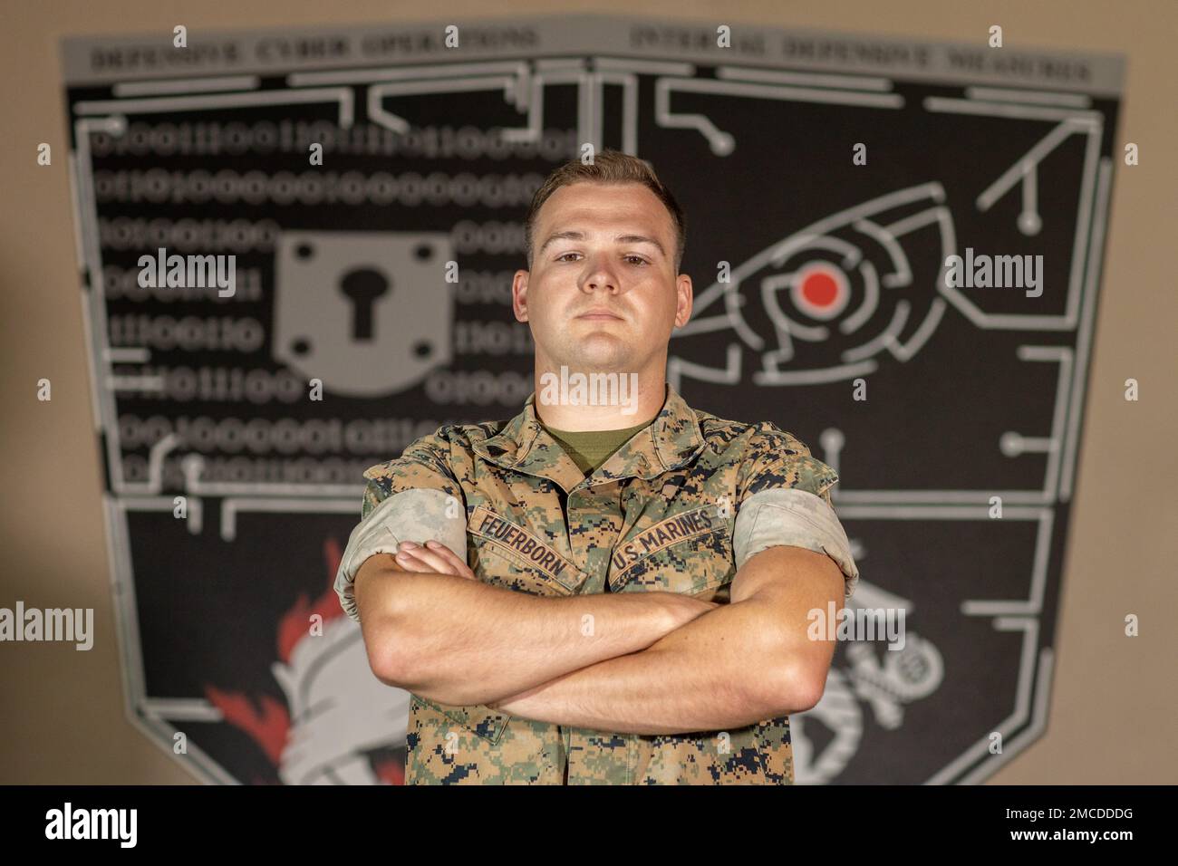 U.S. Marine Corps Cpl. Thomas Feuerborn, a cyberspace warfare operator ...