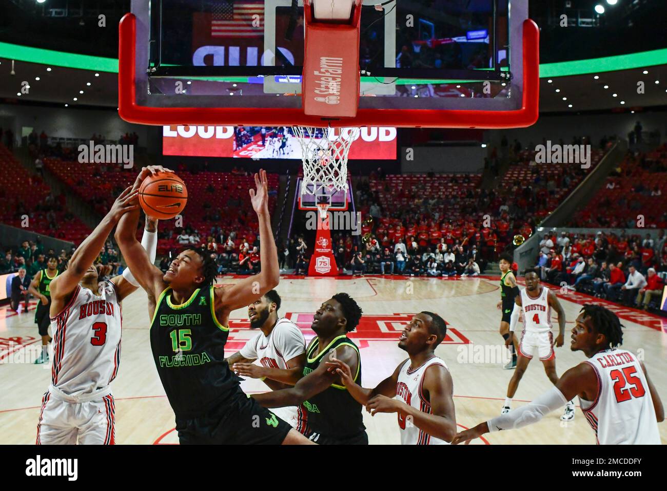 Houston guard Ramon Walker Jr. (3) and South Florida forward Corey ...