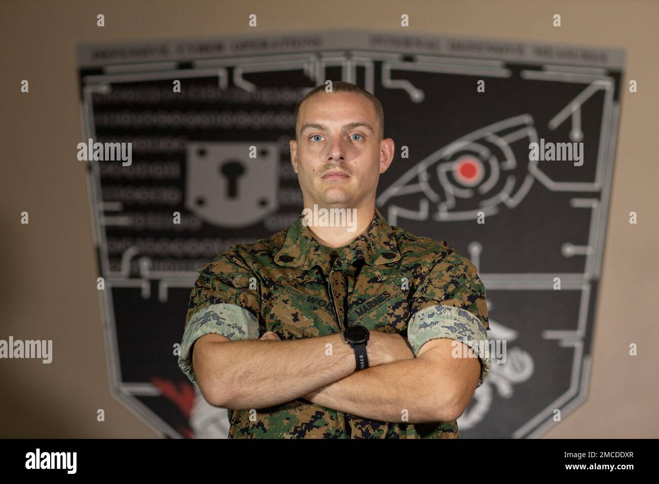 U.S. Marine Corps Staff Sgt. Keith Wolf, a cyberspace warfare operator ...