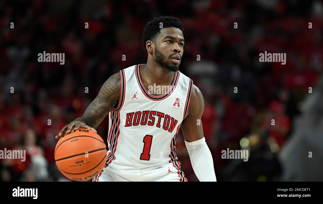 Houston guard Jamal Shead (1) controls the ball against South Florida ...