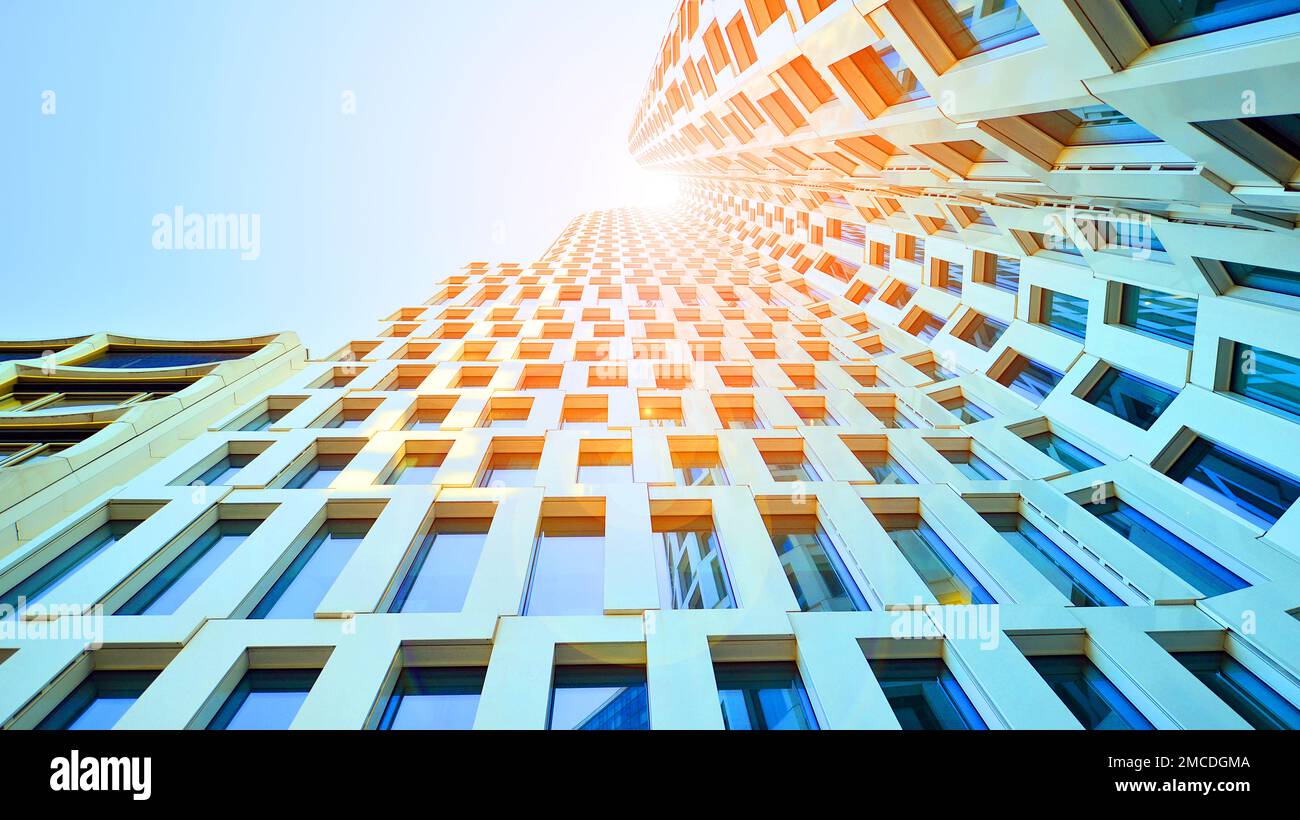 Abstract closeup of the glass-clad facade of a modern building covered ...