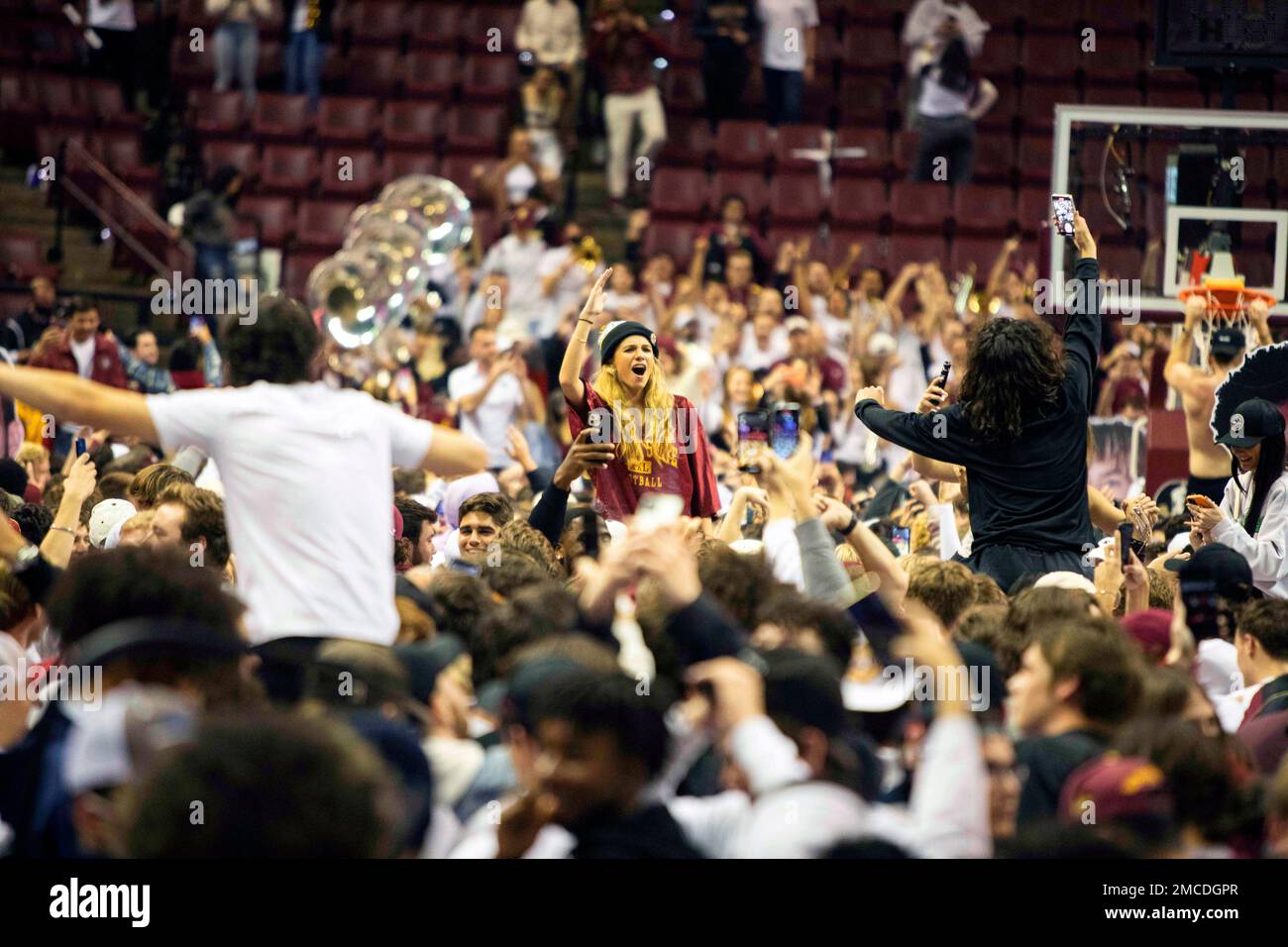 Fans flood the court celebrating Florida State's 79-78 overtime defeat ...