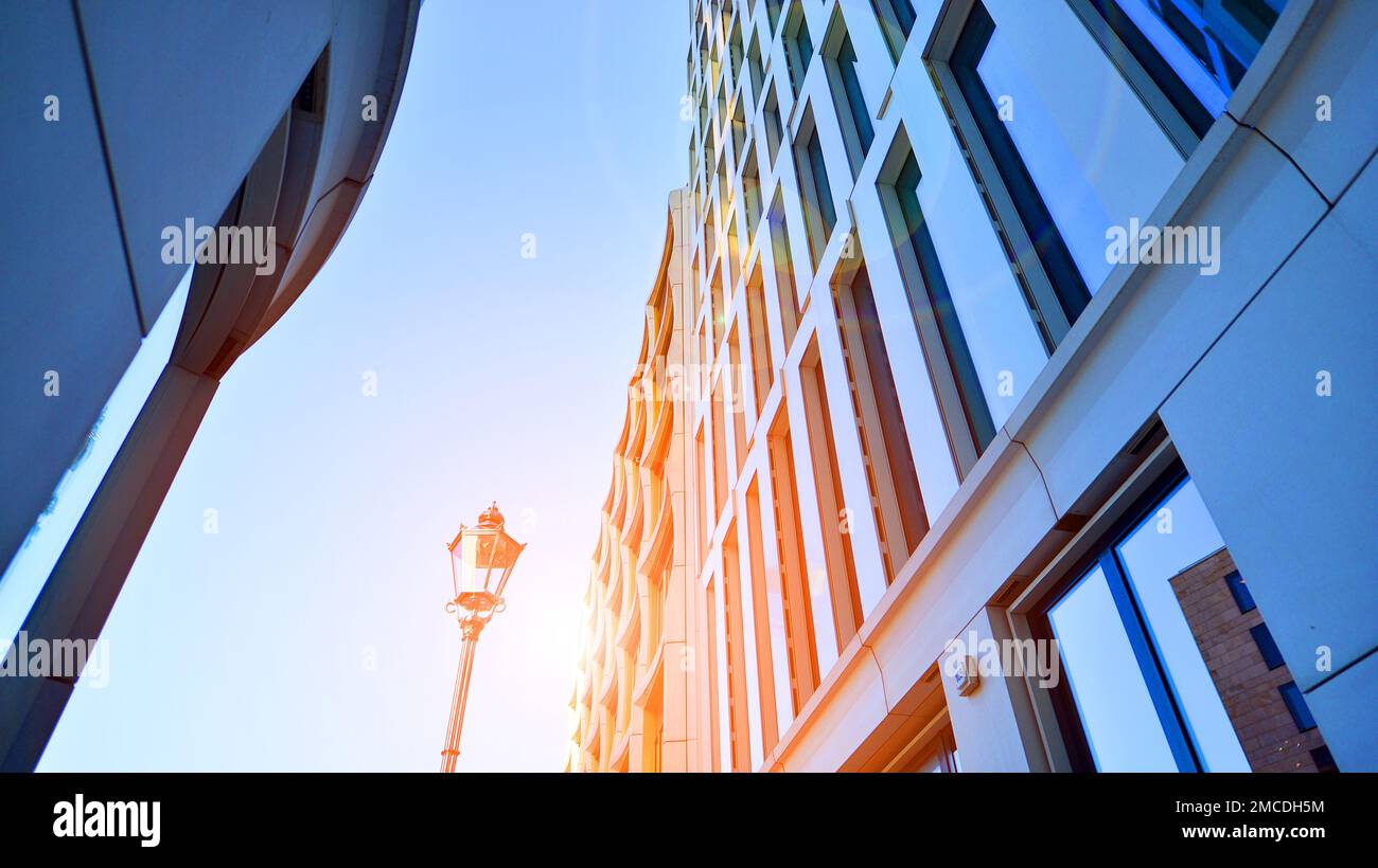 Abstract closeup of the glass-clad facade of a modern building covered ...