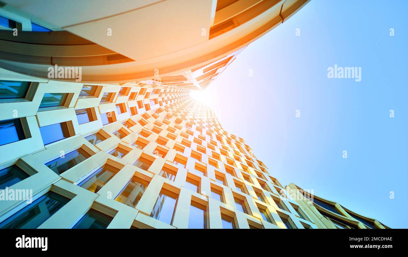 Abstract closeup of the glass-clad facade of a modern building covered ...