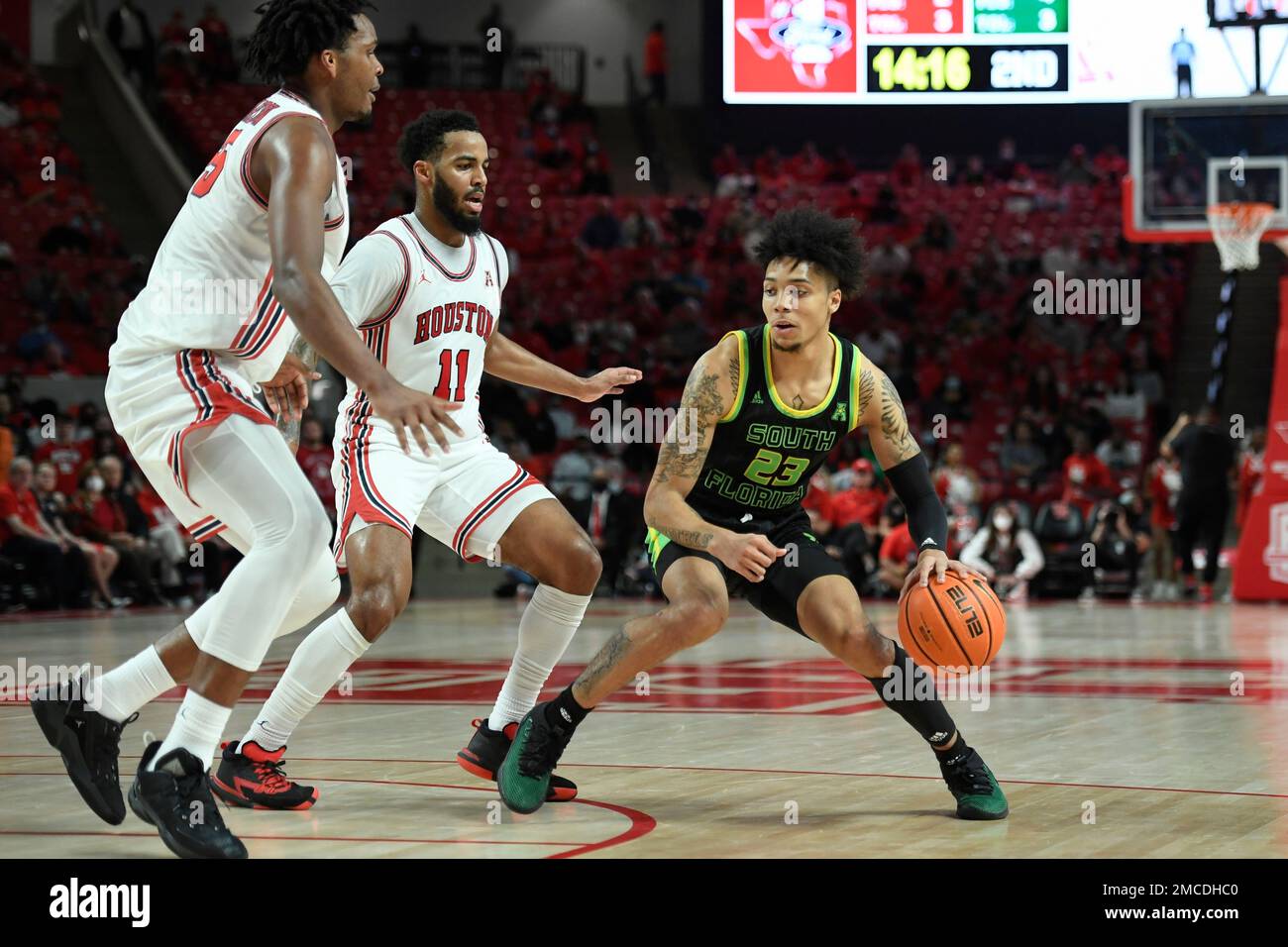 South Florida guard Caleb Murphy (23) drives to the basket against ...