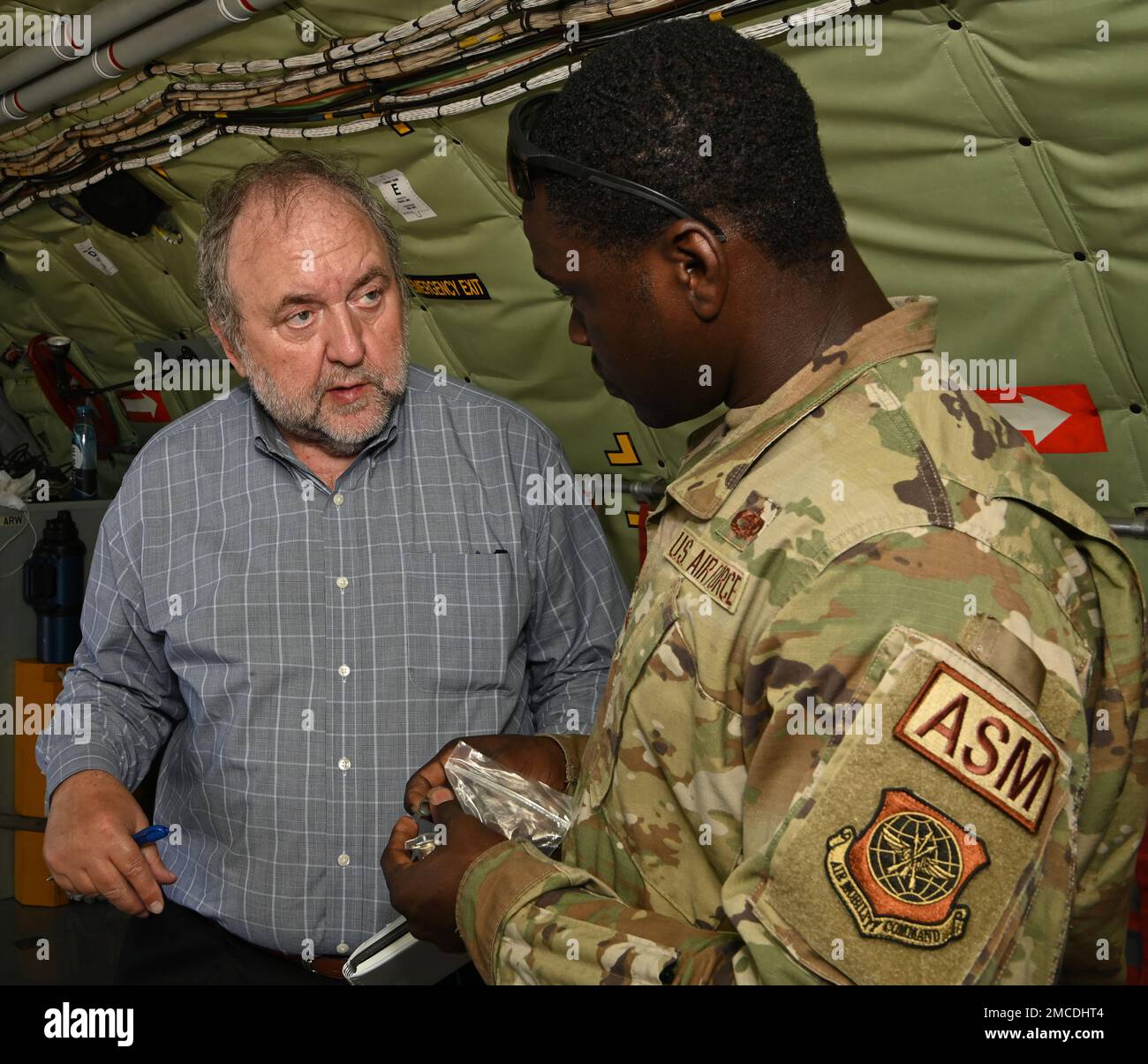 TSgt Jamal Browne and Igor Komsitsky speak with each other at Whiteman ...