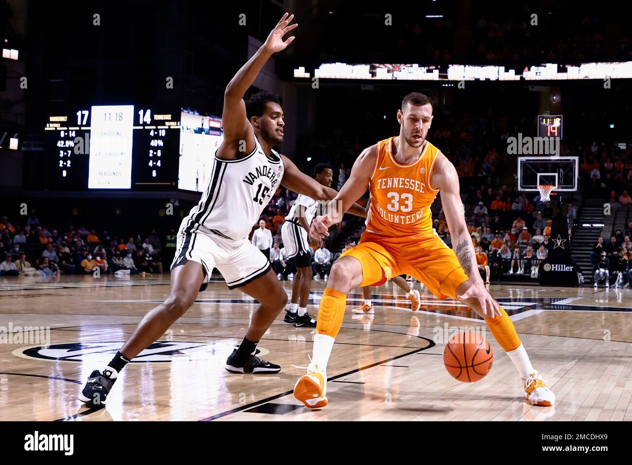 Tennessee forward Uros Plavsic (33) works for a shot as Vanderbilt ...