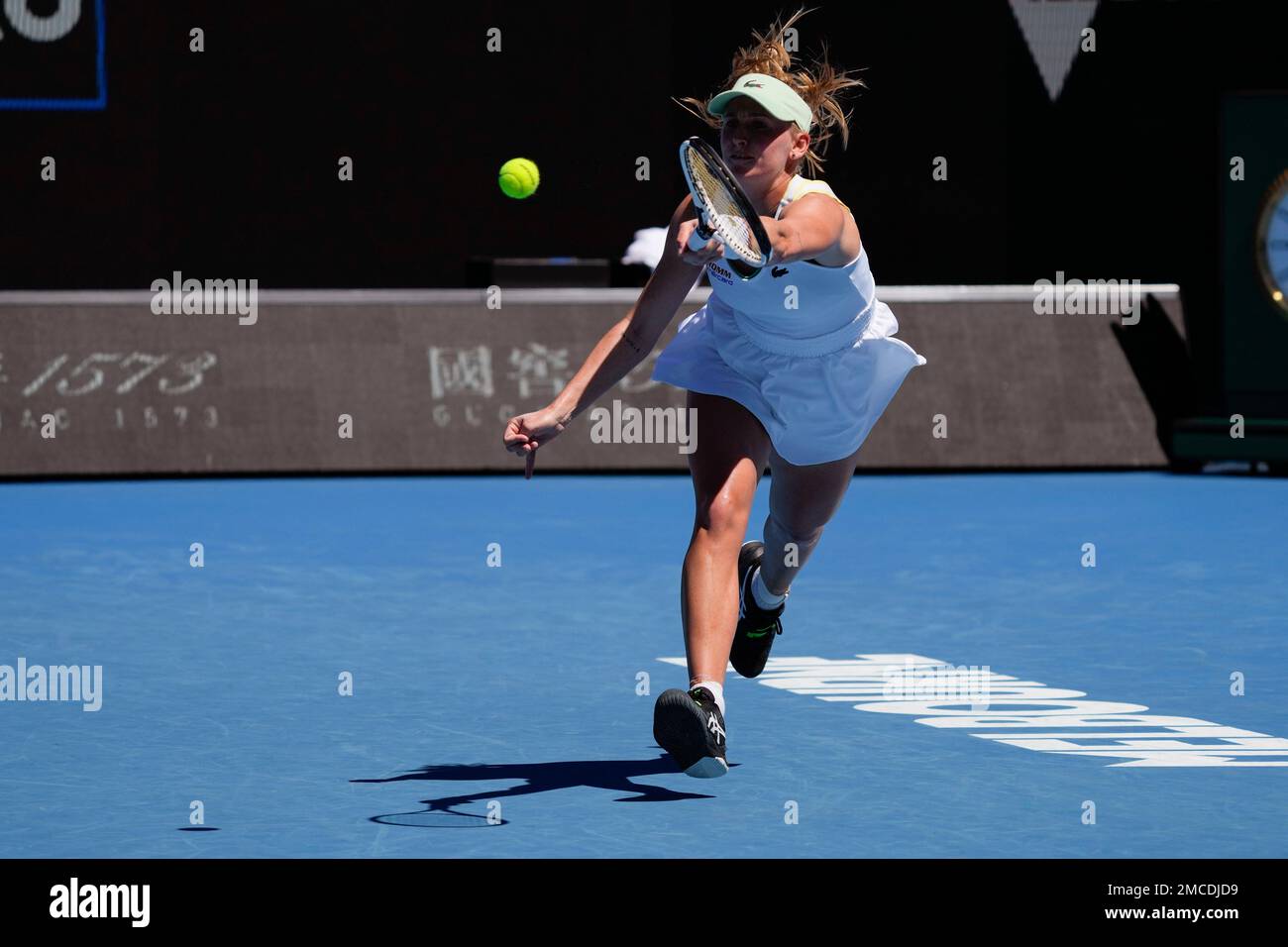 Jil Teichmann of Switzerland plays a forehand return to Victoria ...