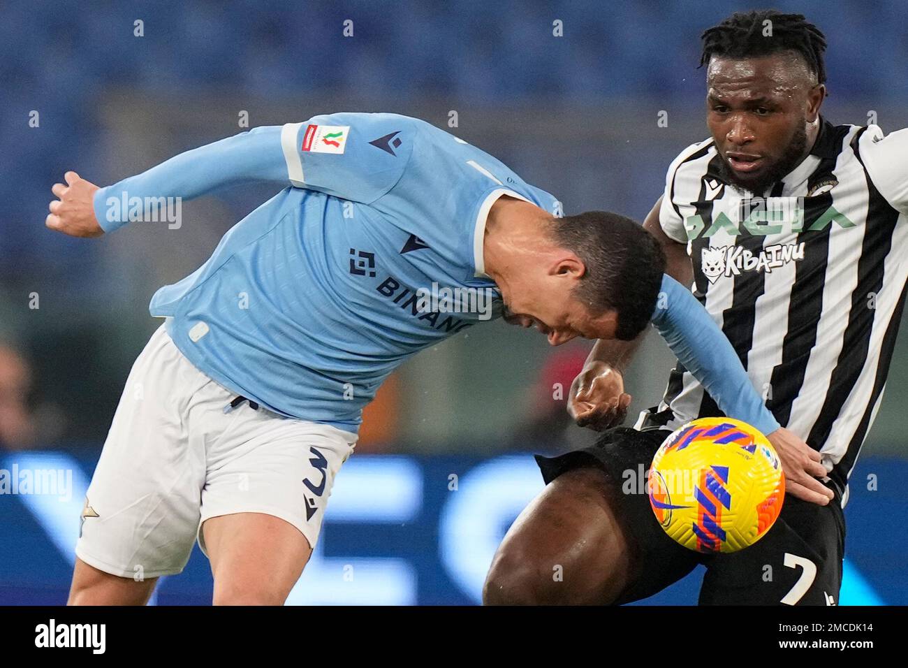 Lazio's Luiz Felipe, left goes to head the ball under pressure from ...