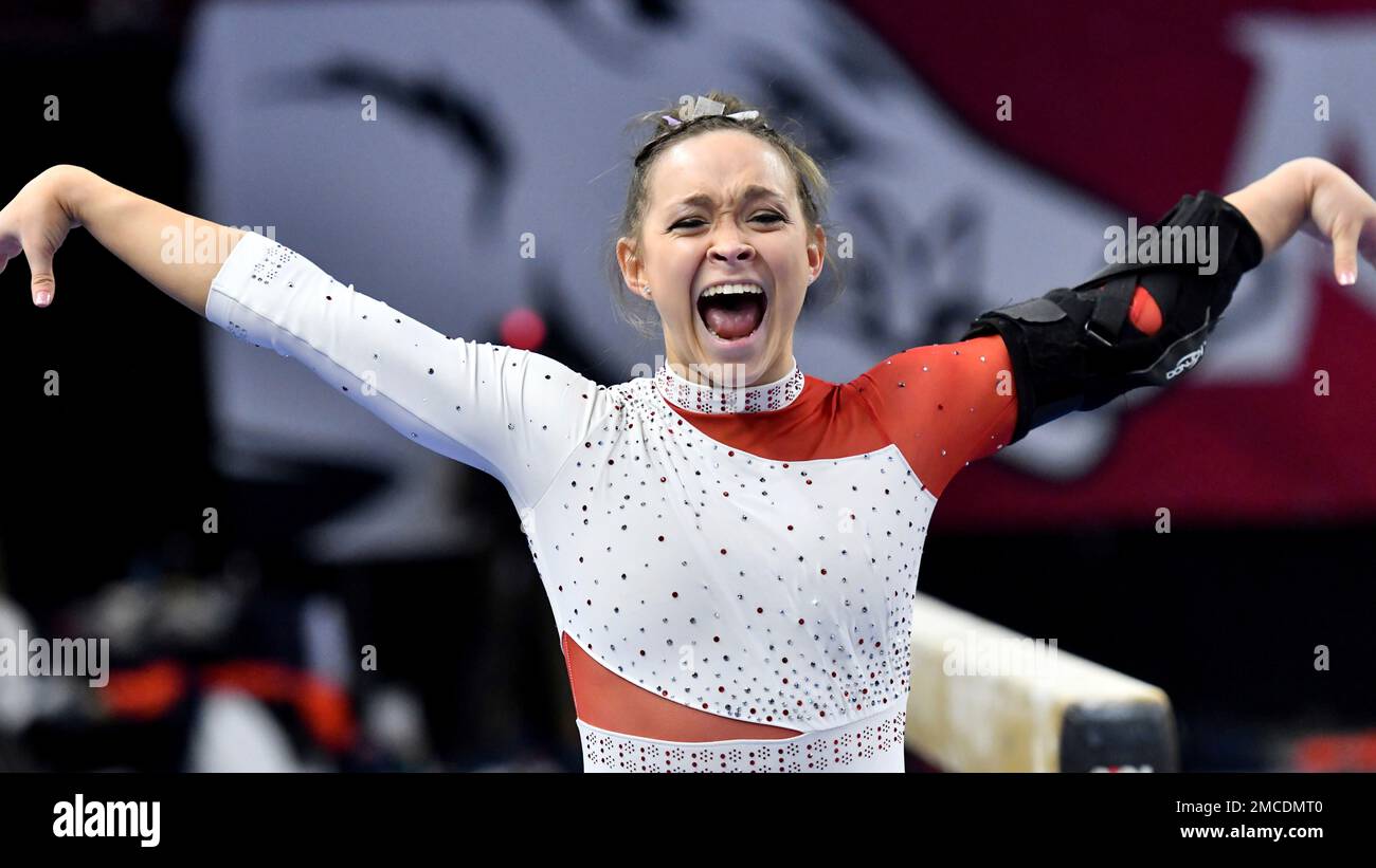 Arkansas gymnast Amanda Elswick performs on the beam against Auburn ...