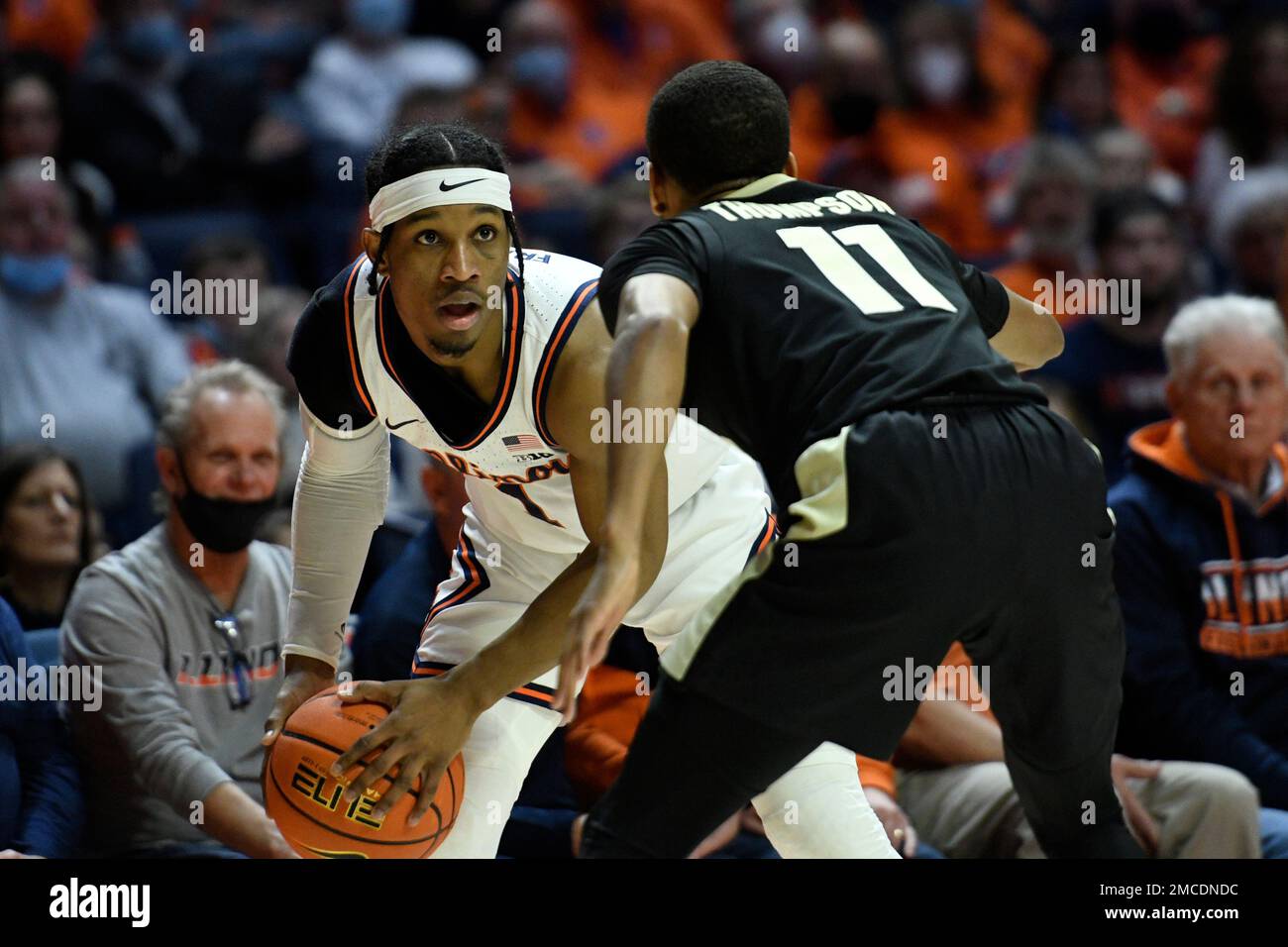 Illinois's Trent Frazier (1) eyes Purdue's Isaiah Thompson during the ...
