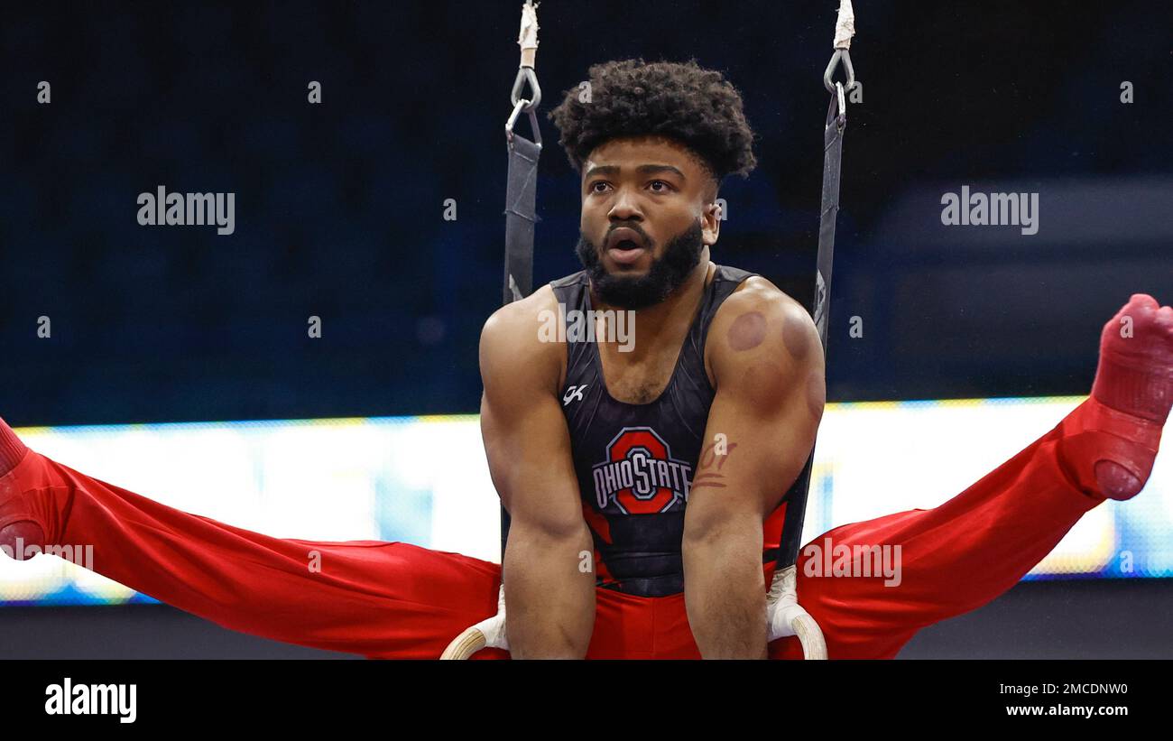 Ohio State's Donovan Hewitt competes on the rings during an NCAA ...