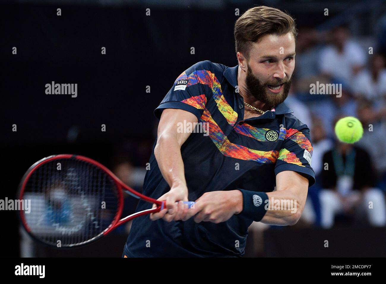 Liam Broady of Britain plays a backhand return to Nick Kyrgios of ...