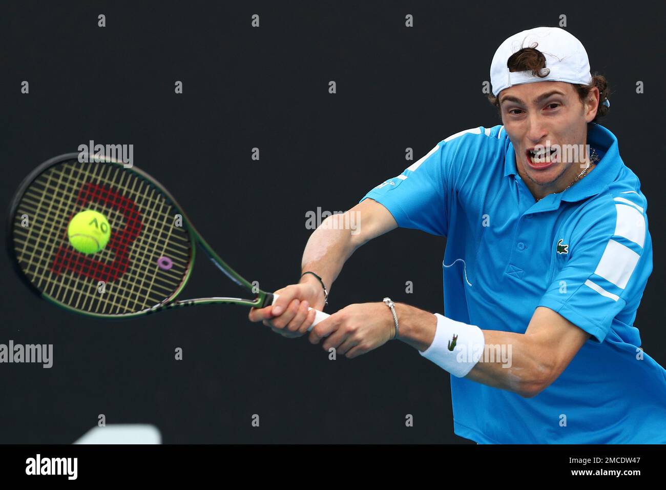 Ugo Humbert of France plays a backhand return to compatriot Richard ...