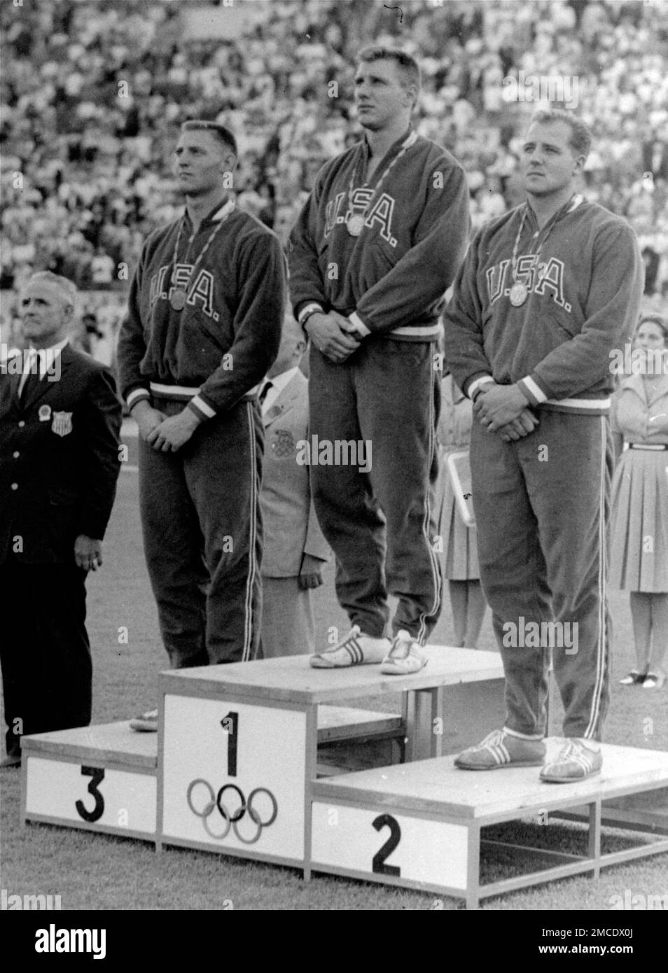 FILE - From left, American discus winners pose on the podium at the ...