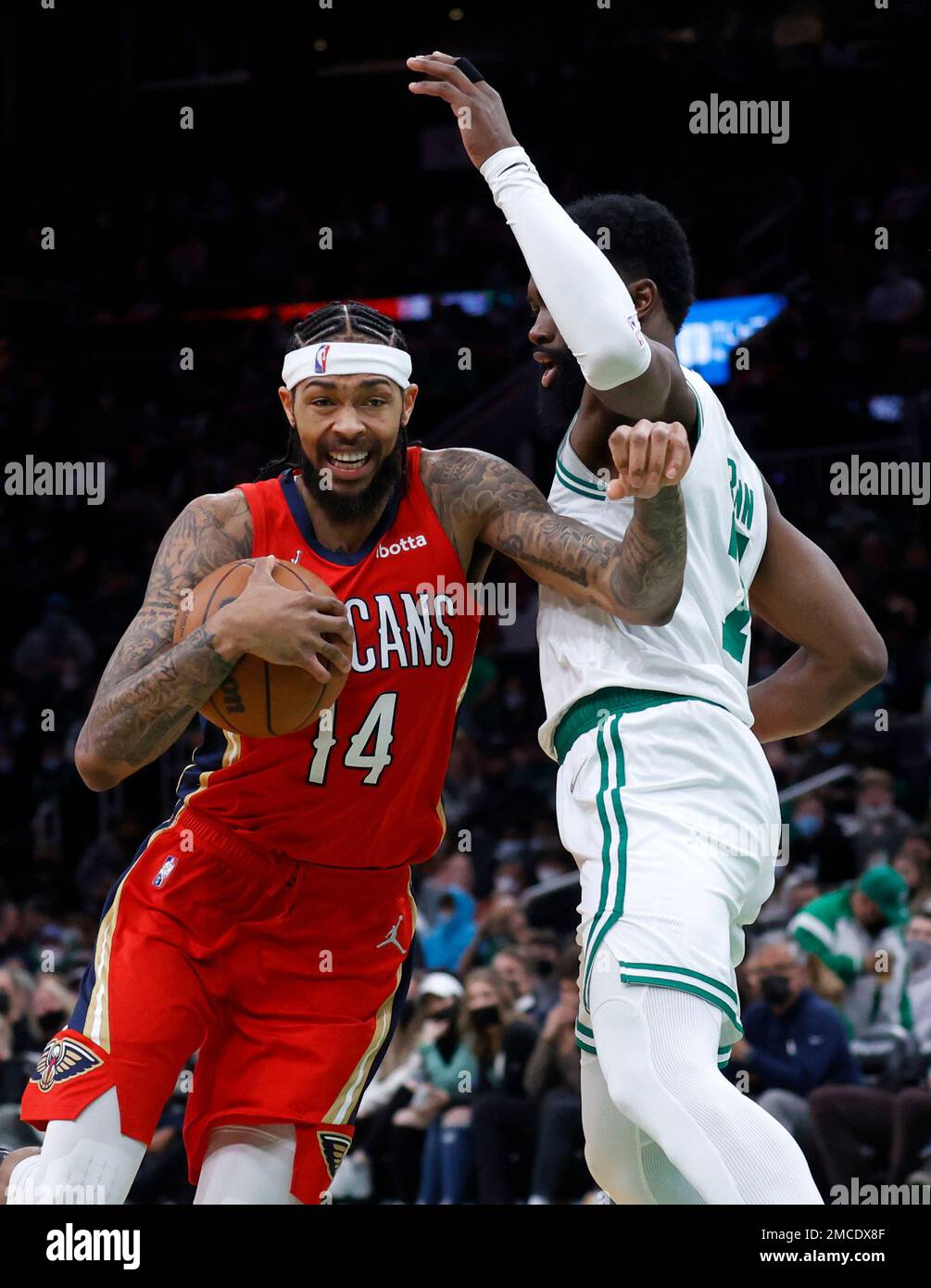 New Orleans Pelicans forward Brandon Ingram (14) drives against Boston ...