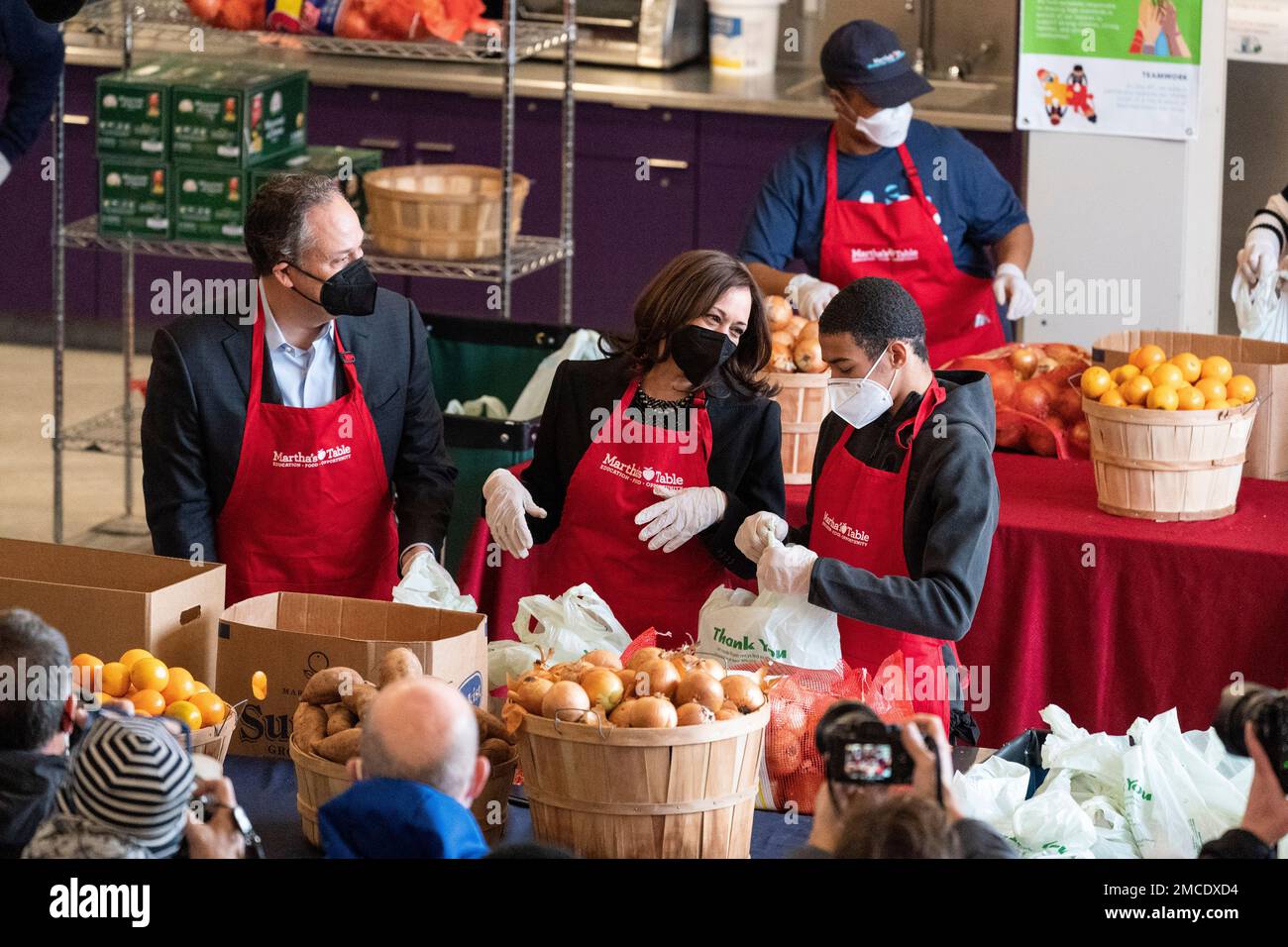 Vice President Kamala Harris, center, with her husband Doug Emhoff ...