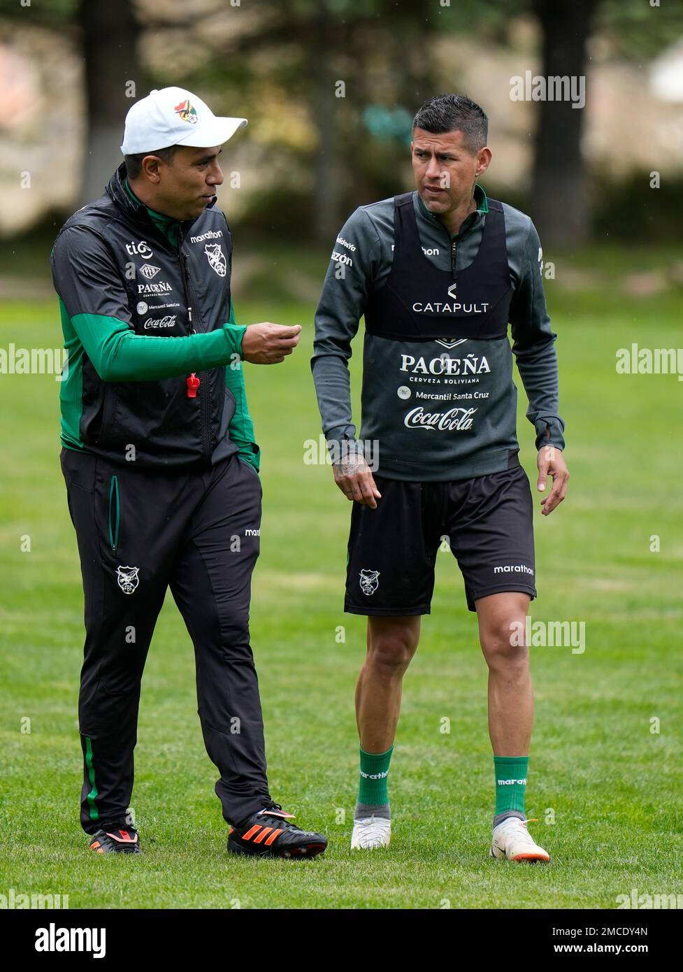 Bolivia's national soccer team coach Cesar Farias, left, speaks with ...
