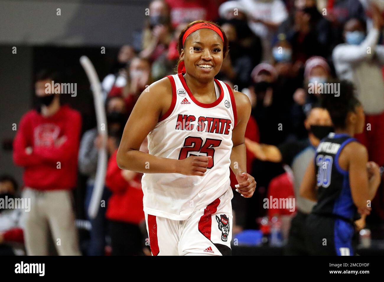 North Carolina State's Kayla Jones (25) celebrates a basket against ...