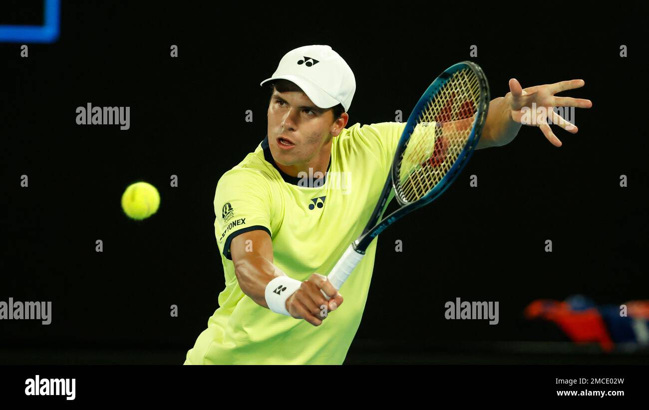 Daniel Altmaier of Germany plays a backhand return to compatriot ...