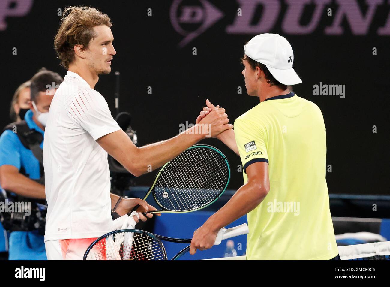 Alexander Zverev, left, of Germany is congratulated by compatriot Daniel Altmaier after winning ...