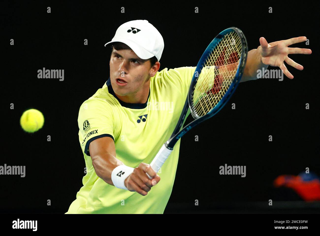 Daniel Altmaier of Germany plays a backhand return to compatriot ...