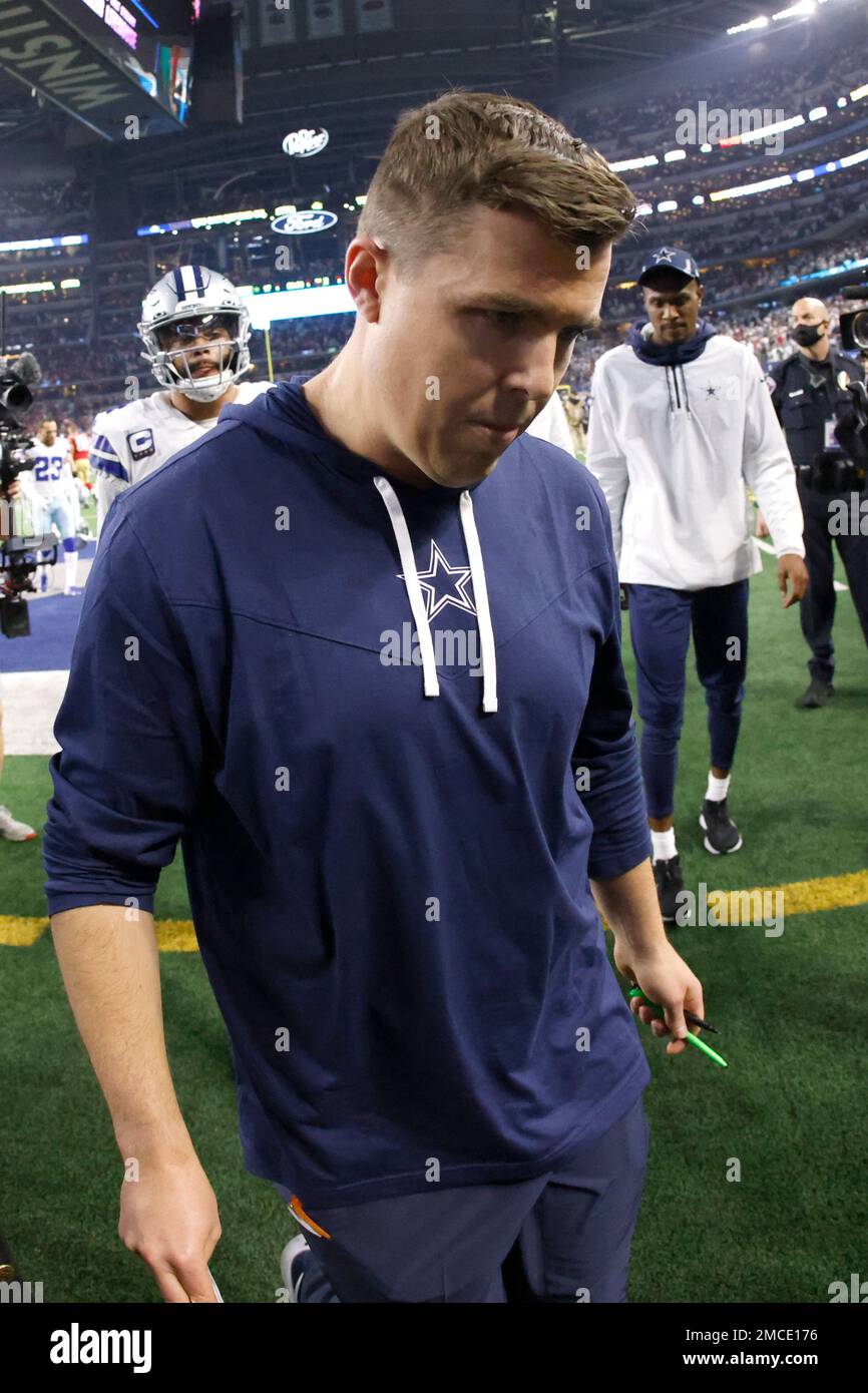 Dallas Cowboys offensive coordinator Kellen Moore leaves the field ...