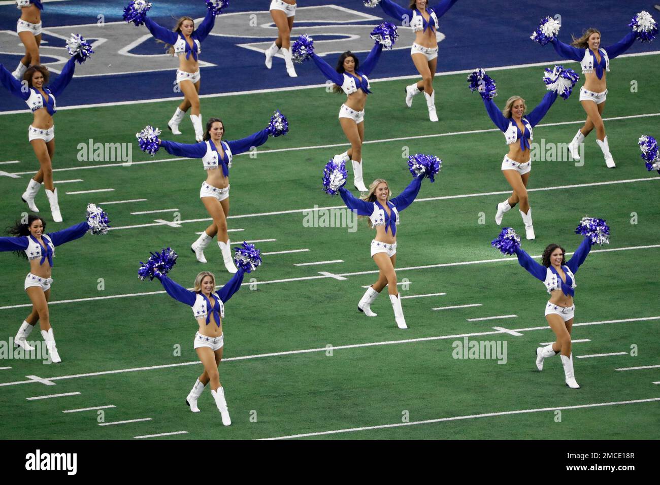 The Dallas Cowboys Cheerleaders perform before the start of an NFL ...