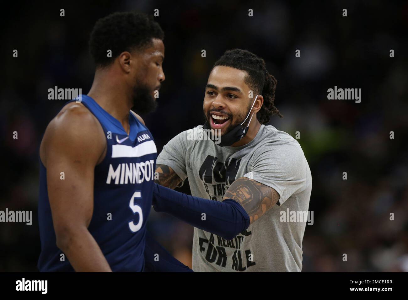 Minnesota Timberwolves guard D'Angelo Russell, right, reacts after ...