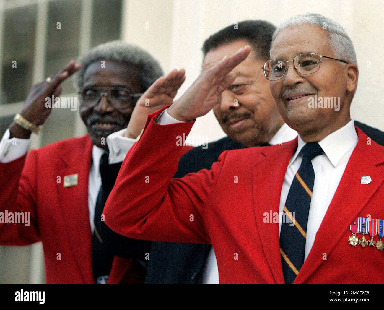 FILE- From left, Tuskegee Airmen, Cicero Satterfield, left, Lucius ...