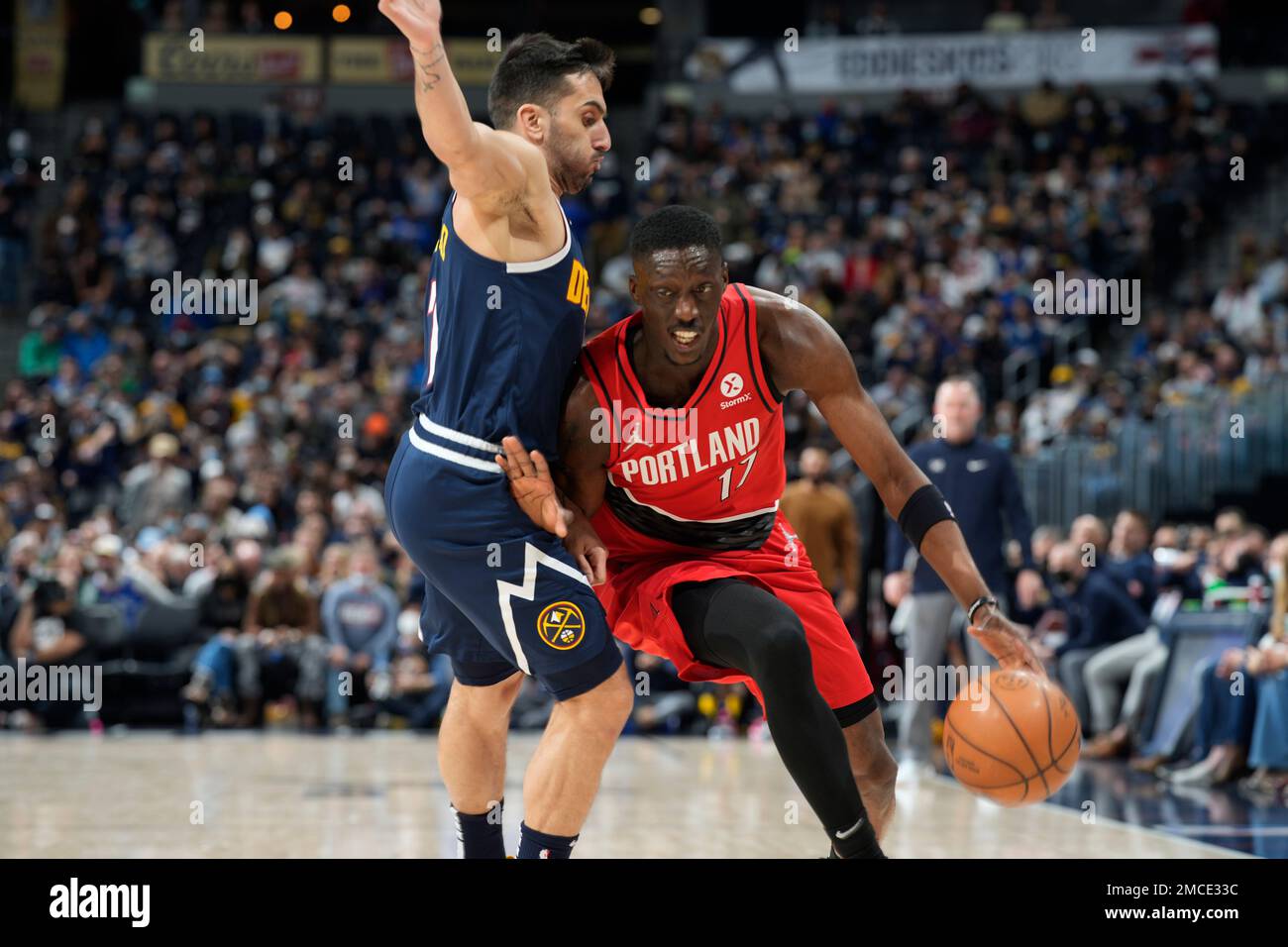 Denver Nuggets guard Facundo Campazzo (7) and Portland Trail Blazers ...