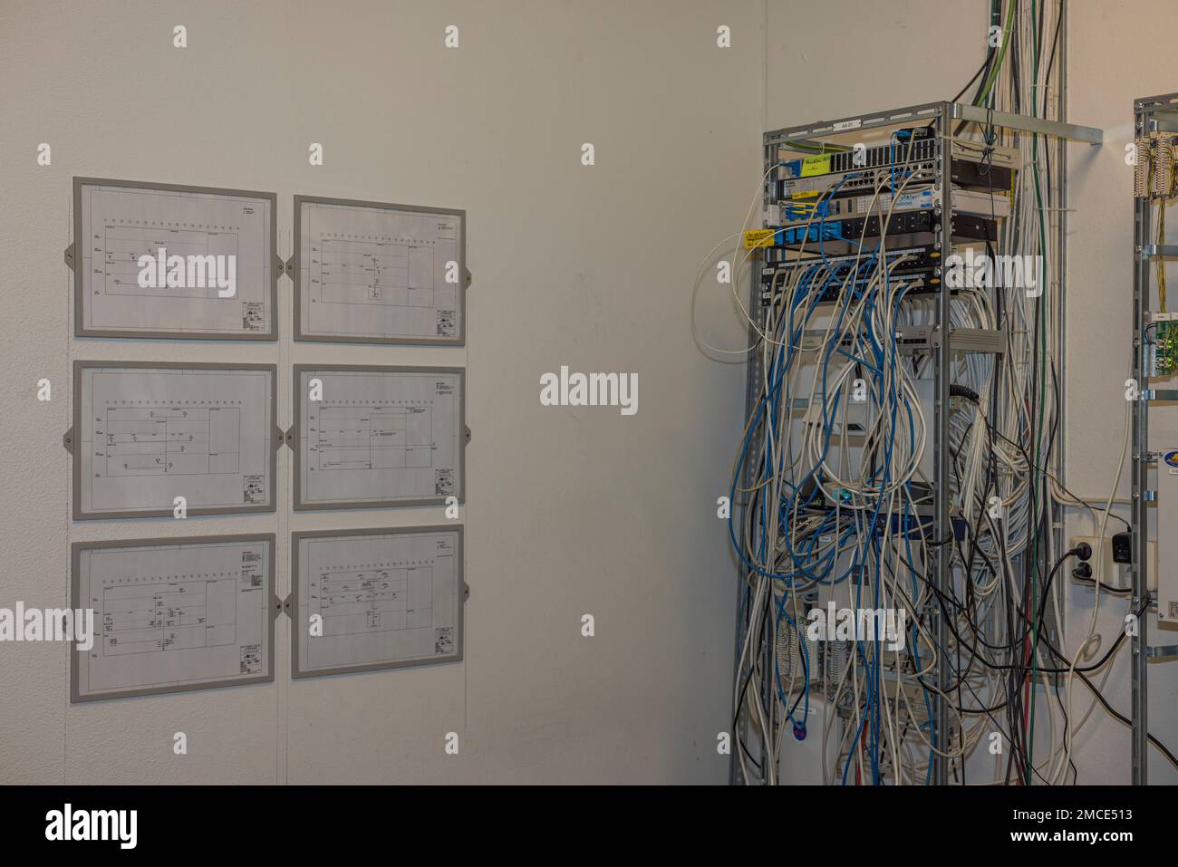 Interior view of technical computer room with all cable connections and ...