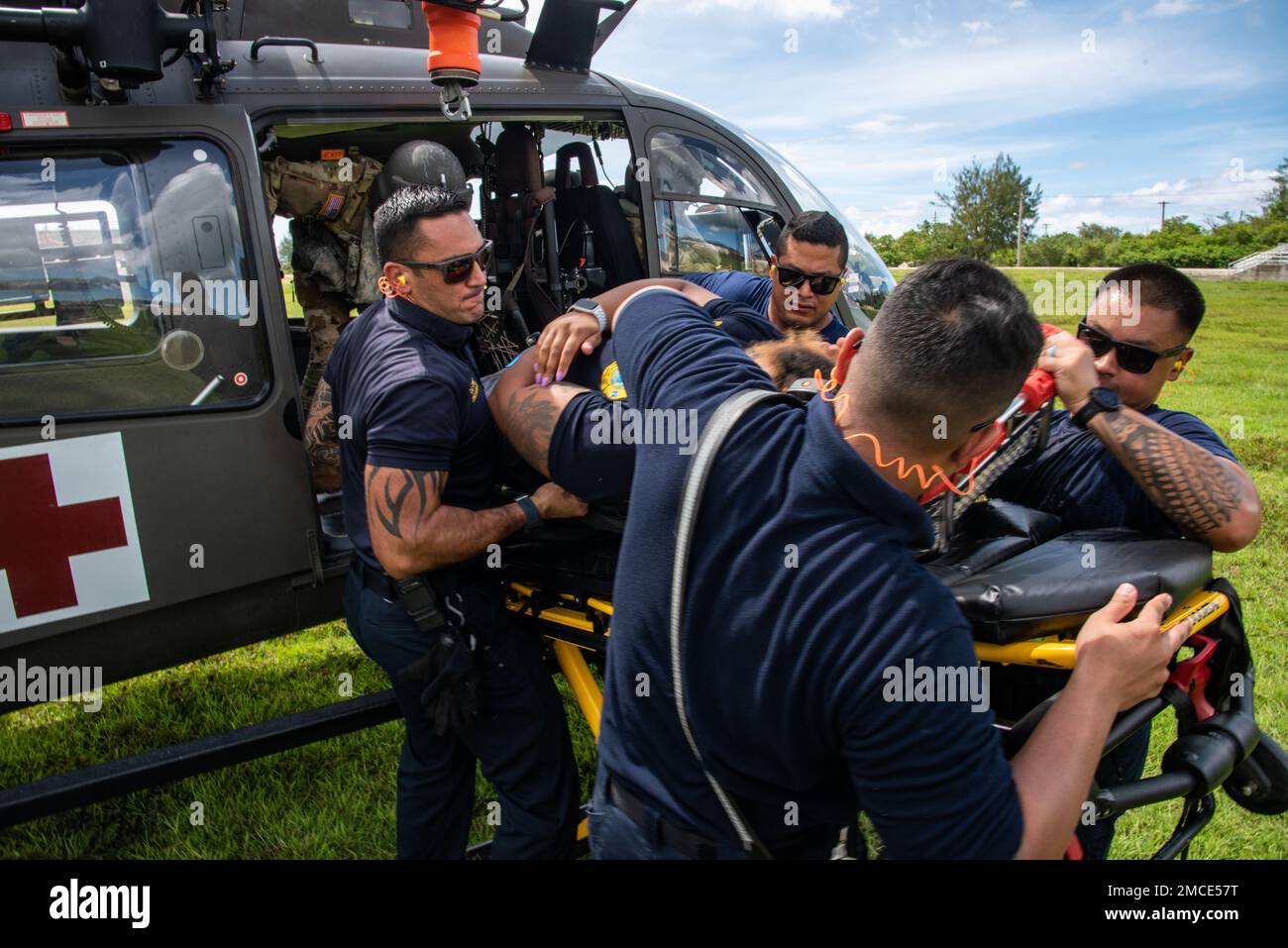 NAVAL BASE Guam (July 11, 2022) - Federal firefighters practice patient ...