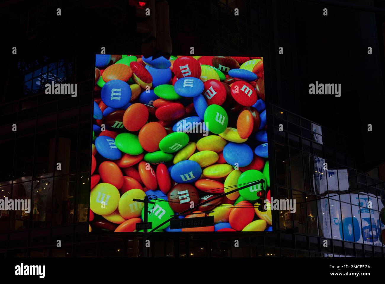 Close-up view of outdoor led screen with colorful mm's candies ...