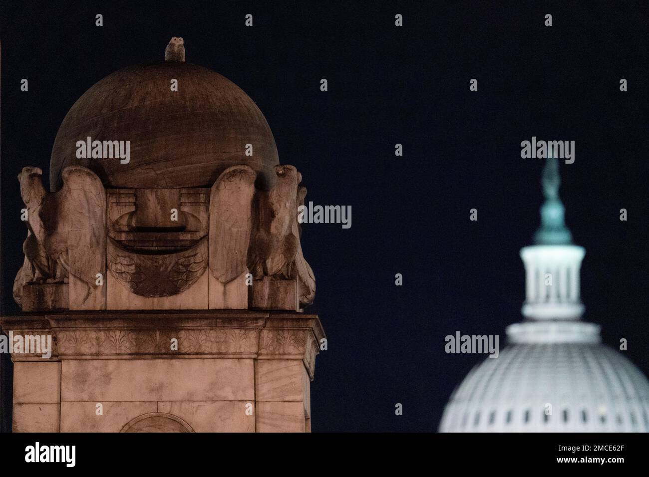 The U.S. Capitol building, right, is seen in the distance as a rare ...