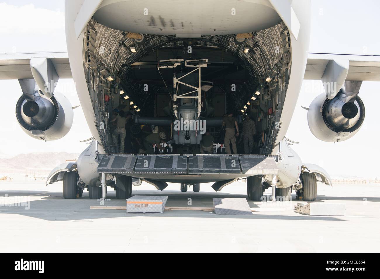 U.S. Marines with Marine Light Attack Helicopter Squadron (HMLA) 267 ...