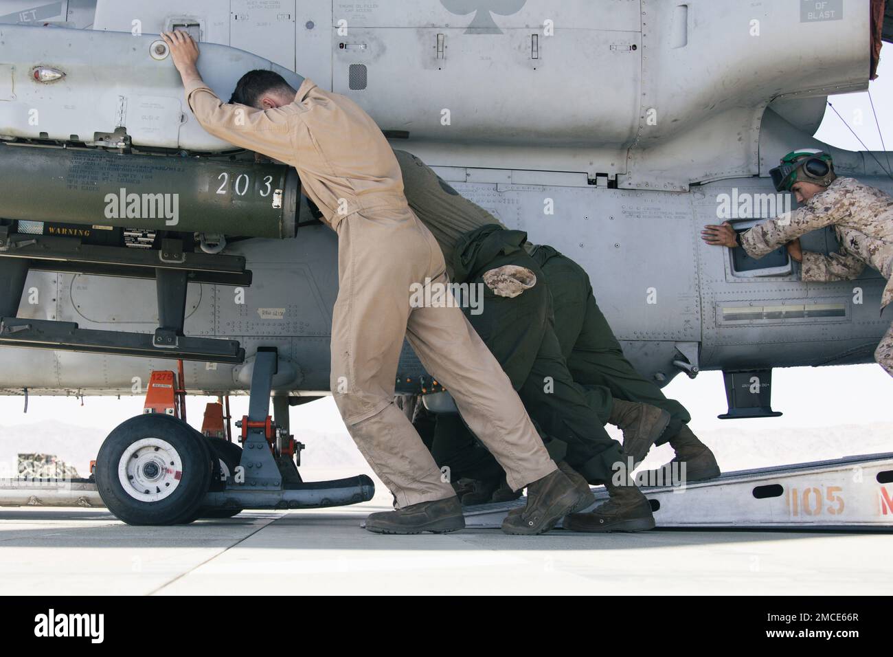 U.S. Marines with Marine Light Attack Helicopter Squadron (HMLA) 267 ...