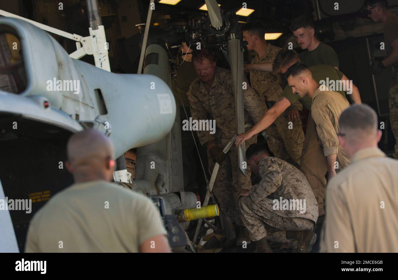 U.S. Marines with Marine Light Attack Helicopter Squadron (HMLA) 267 ...
