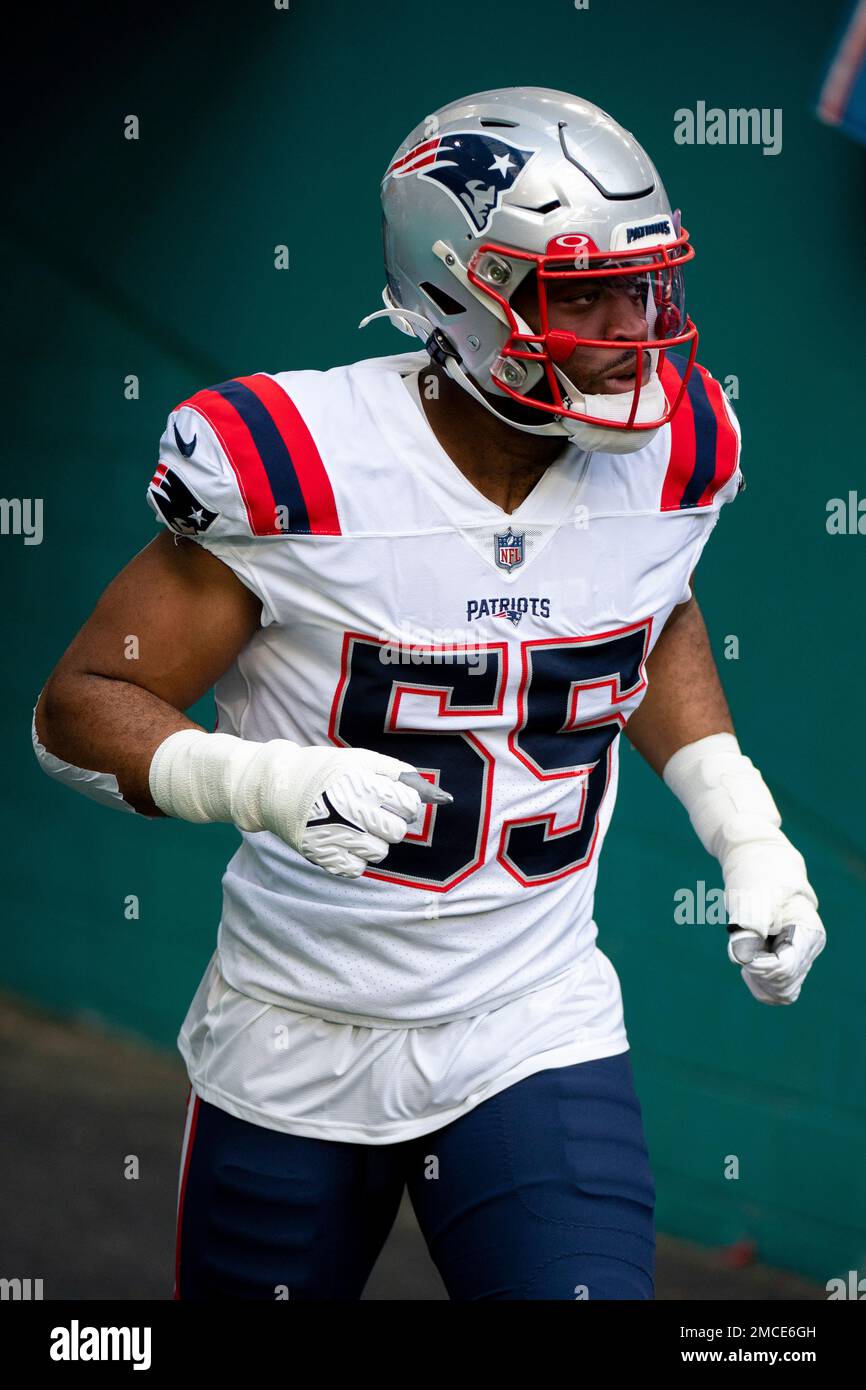 New England Patriots linebacker Josh Uche (55) walks out of the tunnel ...