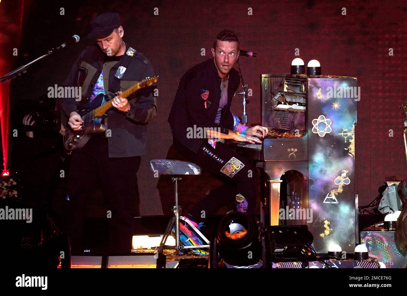 Johnny Buckland, left, and Chris Martin, of Coldplay, perform at ...