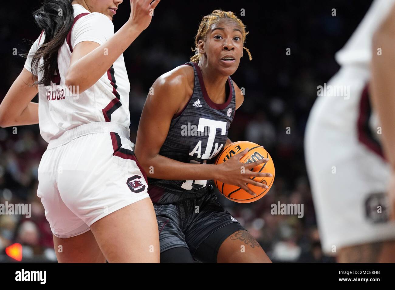 Texas A&M forward Maliyah Johnson (14) drives to the hoop against South ...