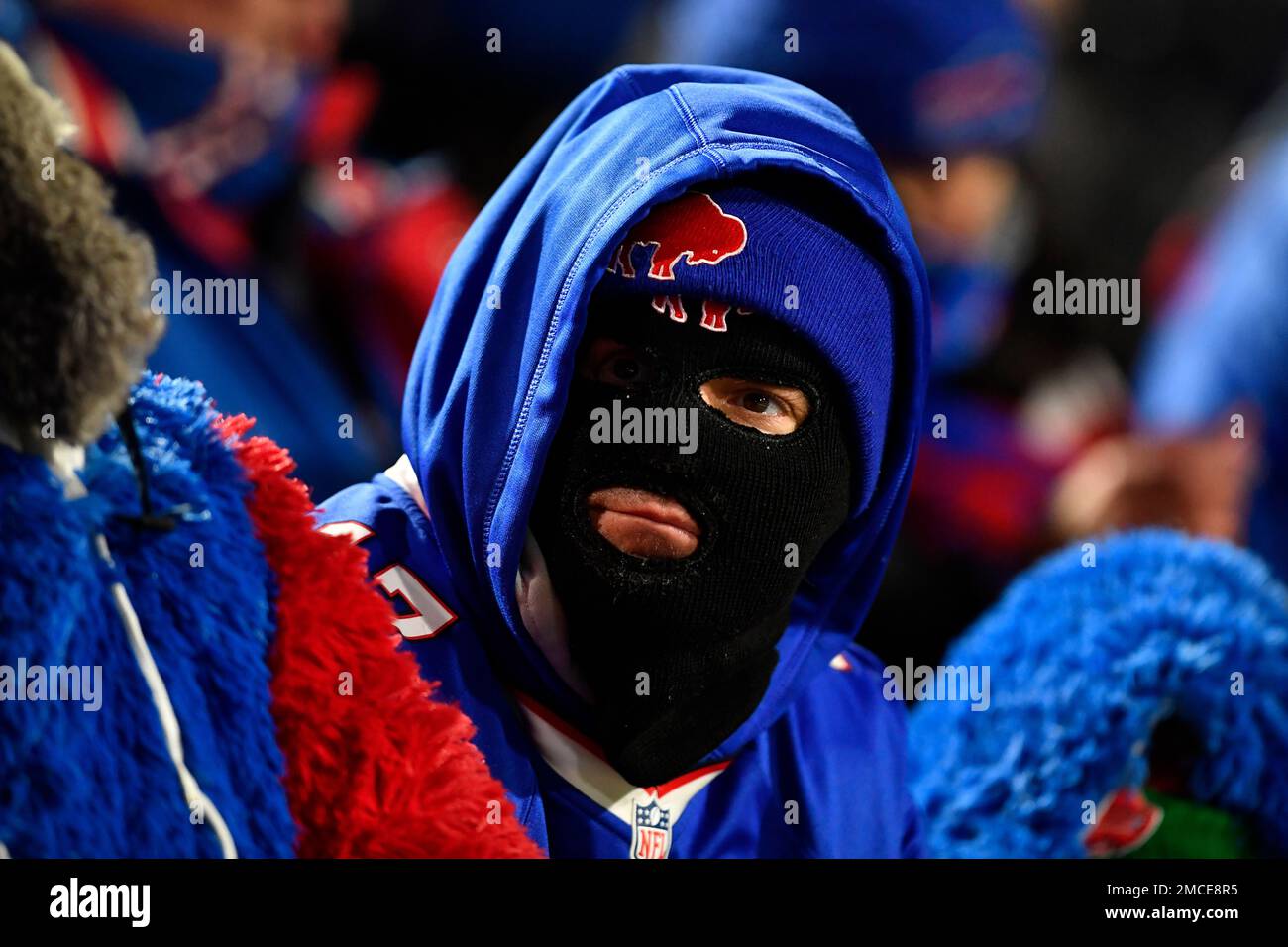 Buffalo Bills brave the cold in the stands before an NFL wild-card ...