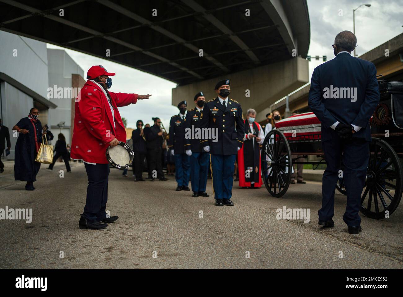 A second line takes place after a memorial service at The National ...