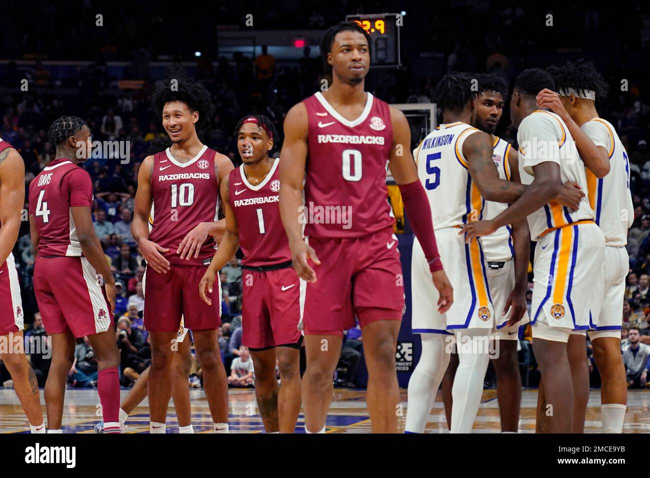 Arkansas reacts late in the second half of an NCAA college basketball ...