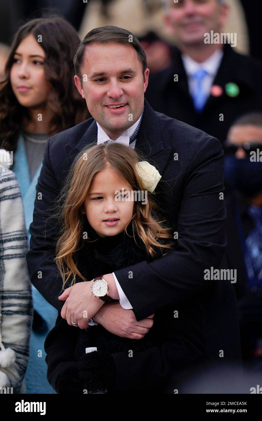 Virginia Attorney General Jason Miyares stands with his daughter ...