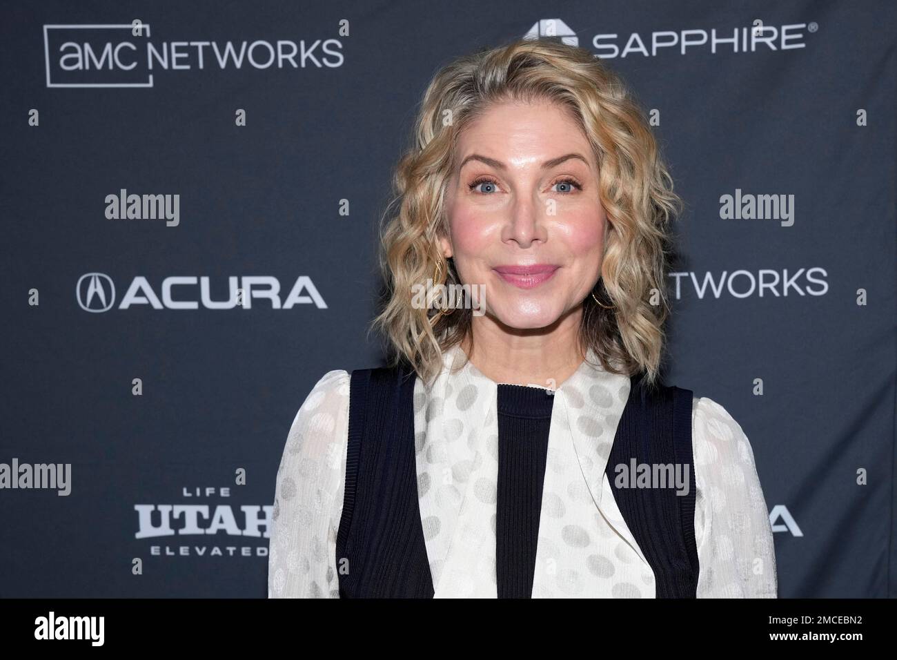 Elizabeth Mitchell attends the premiere of "Aliens Abducted My Parents ...