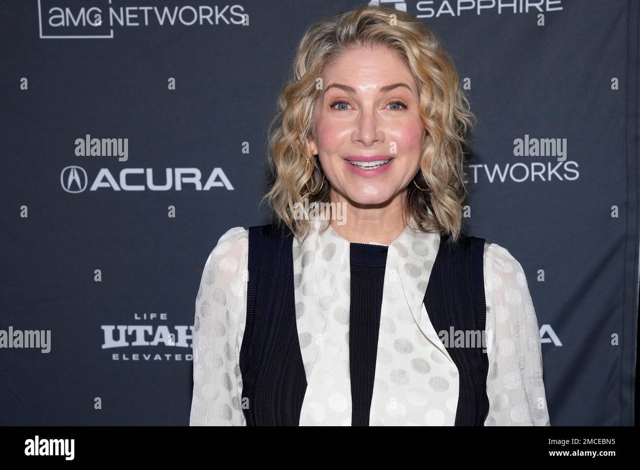 Elizabeth Mitchell attends the premiere of "Aliens Abducted My Parents ...