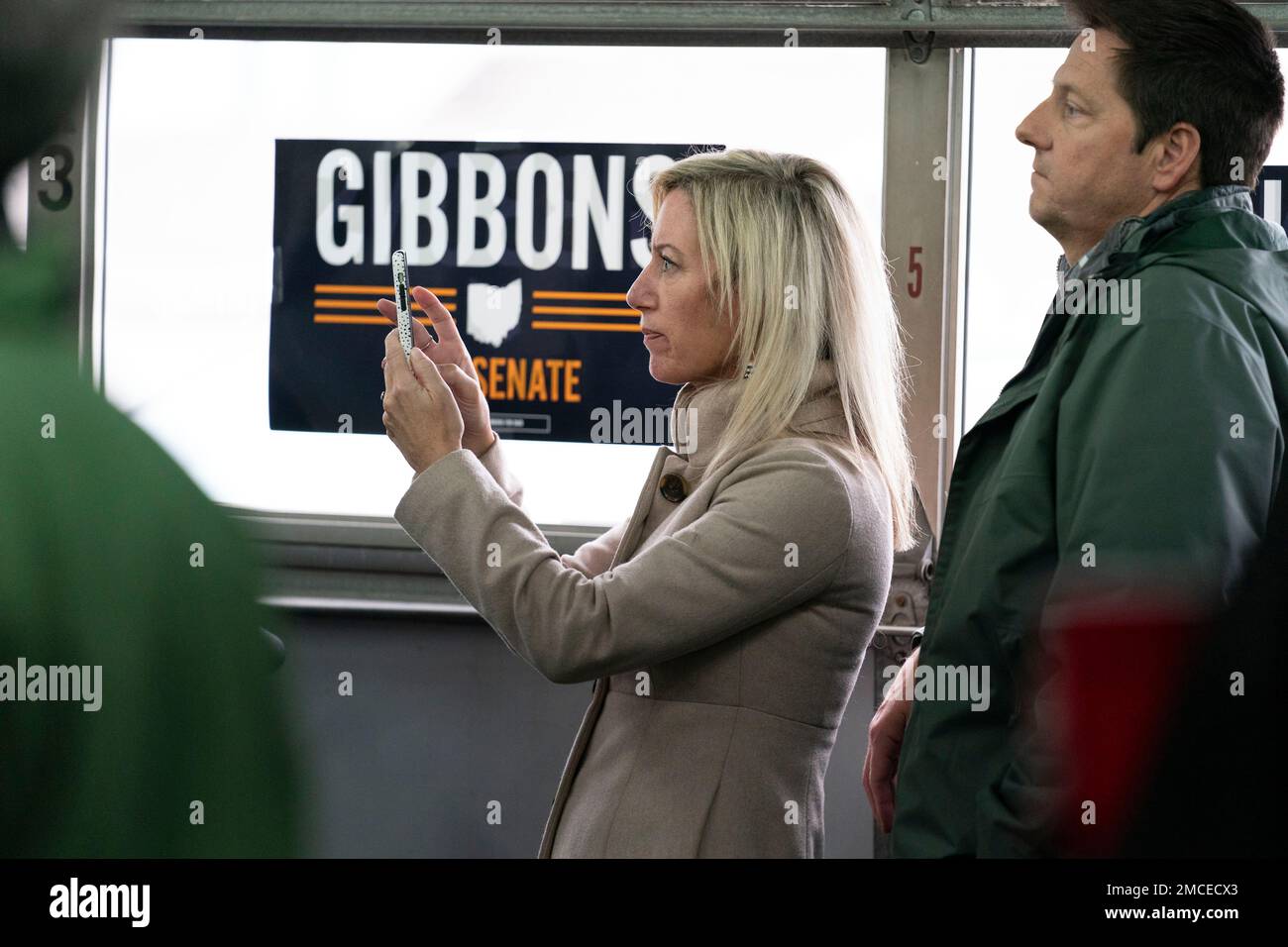 Supporters record Mike Gibbons as he speaks during a campaign rally in ...